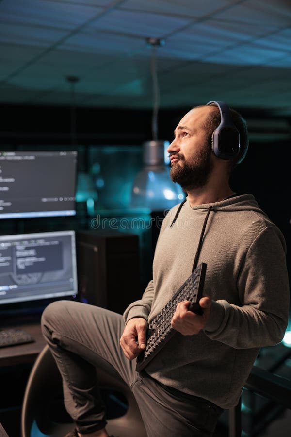 Male Coder Singing and Playing Guitar with Keyboard Stock Image - Image ...