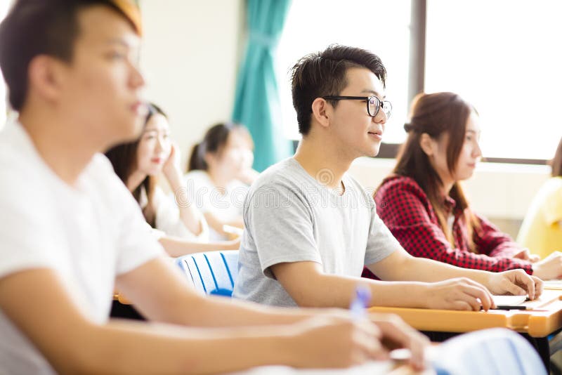 Happy Young Group College Student in Classroom Stock Photo - Image of ...