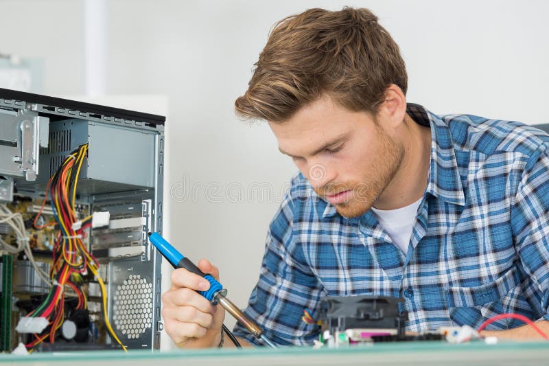 Male Computer Technician Using Soldering Iron Stock Image - Image of ...