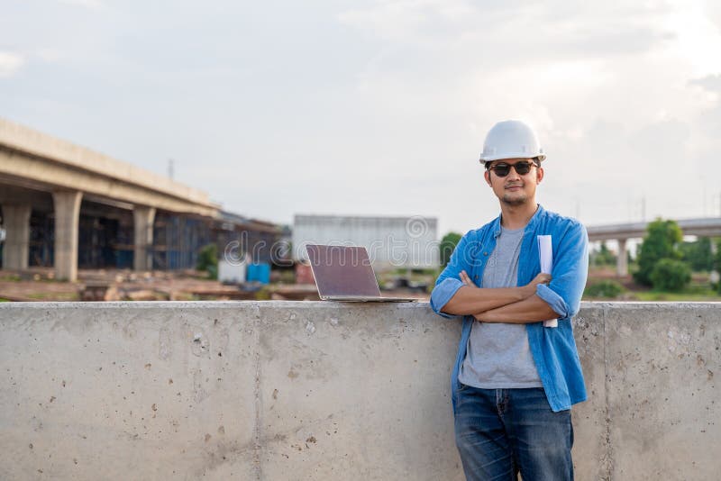 A Male Construction Engineer Inspected at Road Construction Site Stock ...