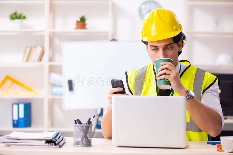 The Male Construction Engineer Working in the Office Stock Photo ...
