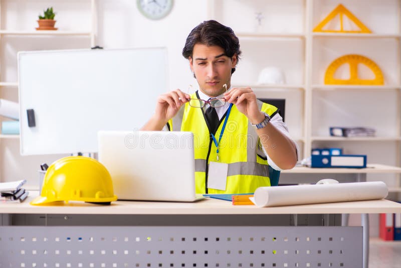 The Male Construction Engineer Working in the Office Stock Photo ...