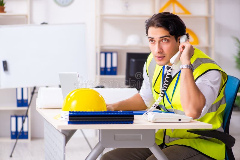 The Male Construction Engineer Working in the Office Stock Photo ...