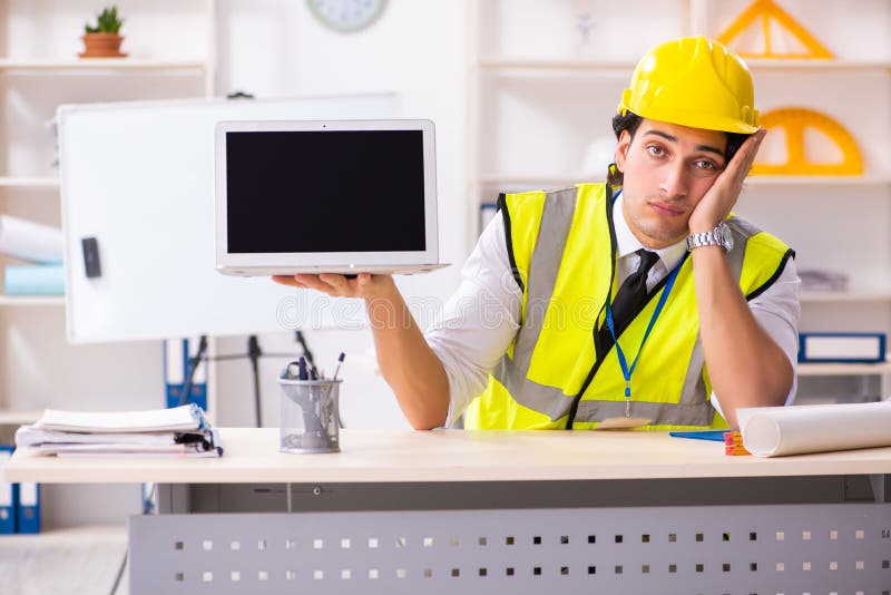 The Male Construction Engineer Working in the Office Stock Photo ...