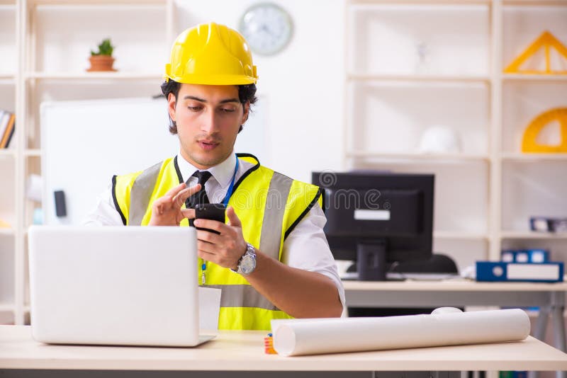 The Male Construction Engineer Working in the Office Stock Photo ...