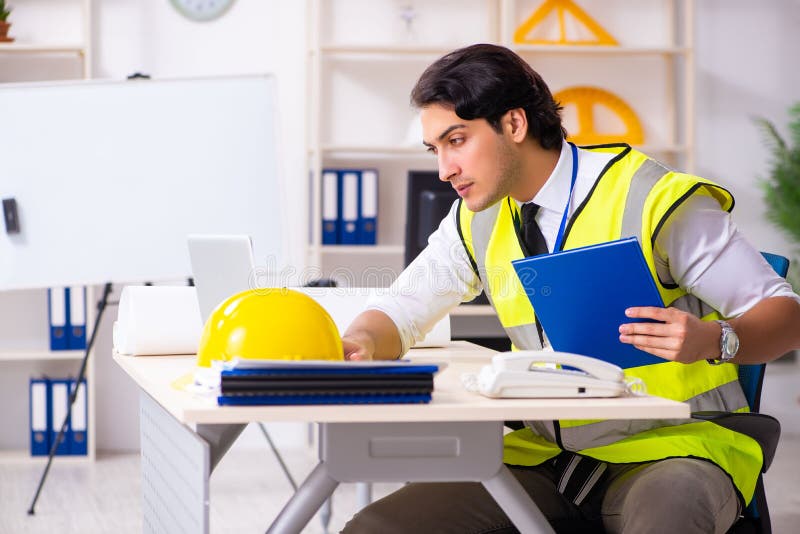 The Male Construction Engineer Working in the Office Stock Photo ...