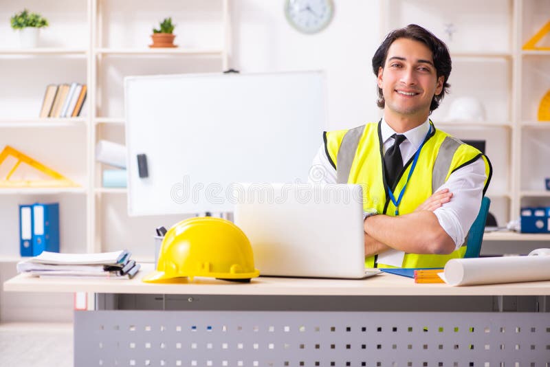 The Male Construction Engineer Working in the Office Stock Photo ...