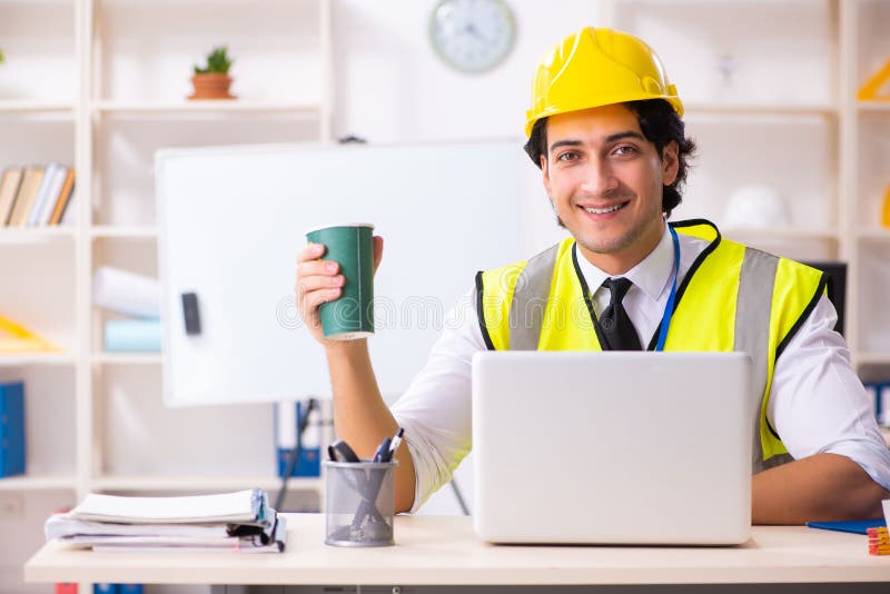 The Male Construction Engineer Working in the Office Stock Image ...