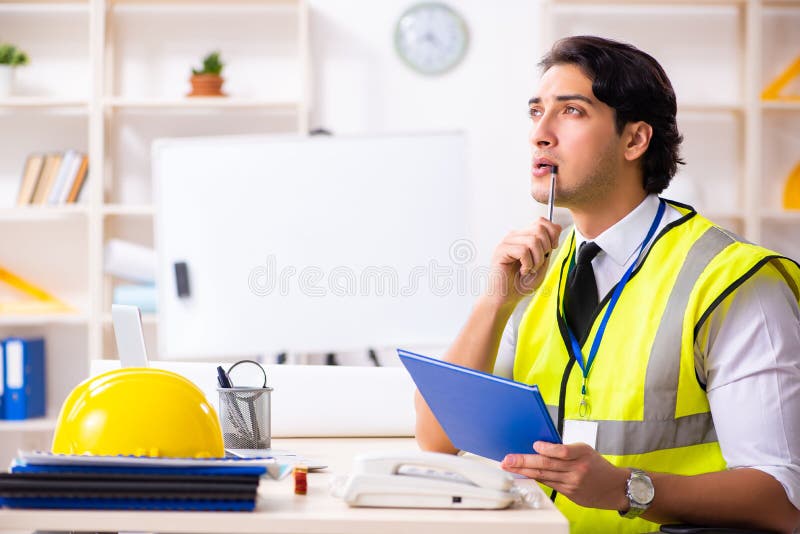 The Male Construction Engineer Working in the Office Stock Image ...