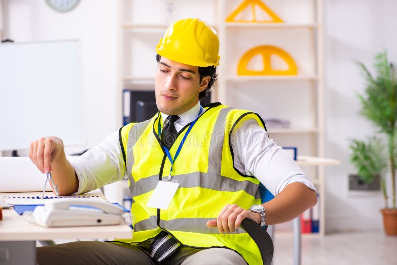 The Male Construction Engineer Working in the Office Stock Photo ...