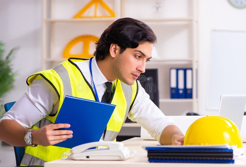 Male Construction Engineer Working in the Office Stock Image - Image of ...