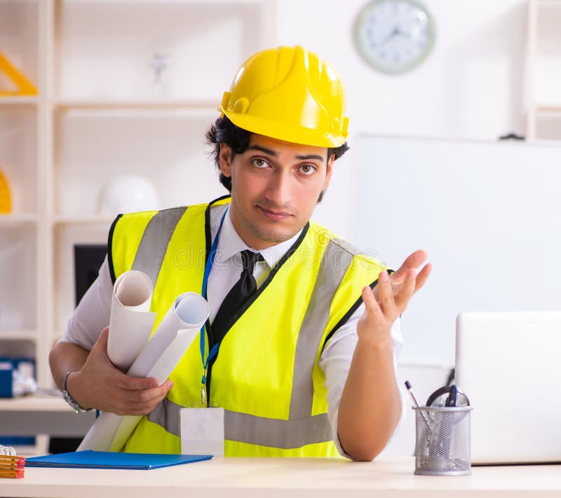 Male Construction Engineer Working in the Office Stock Photo - Image of ...