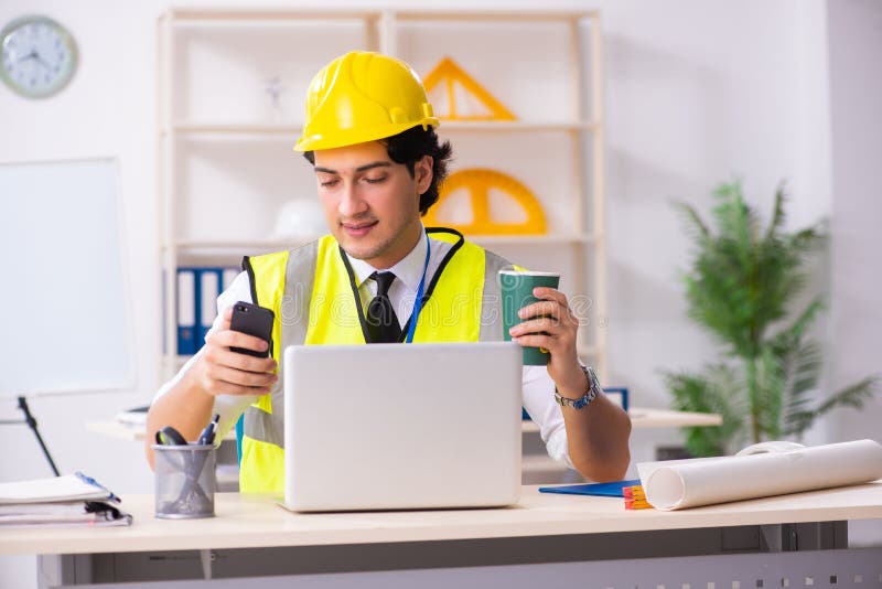 The Male Construction Engineer Working in the Office Stock Photo ...