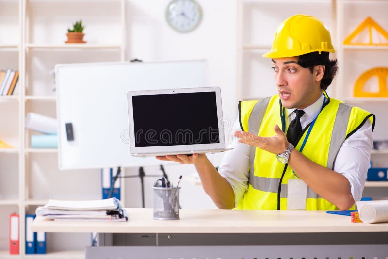 The Male Construction Engineer Working in the Office Stock Image ...