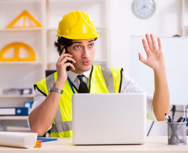 Male Construction Engineer Working in the Office Stock Image - Image of ...