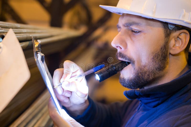 Male Construction Inspector Taking Notes Stock Image - Image of ...