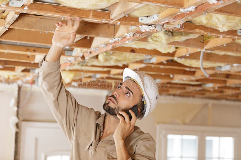 Male Construction Worker Builder Working on Ceiling Stock Image - Image ...