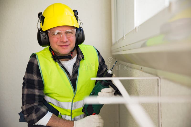 Male Construction Worker in Hard Hat Drilling Concrete Wall Stock Image ...