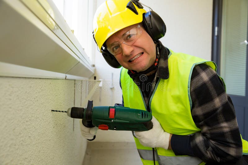 Male Construction Worker in Hard Hat Drilling Concrete Wall Stock Photo ...