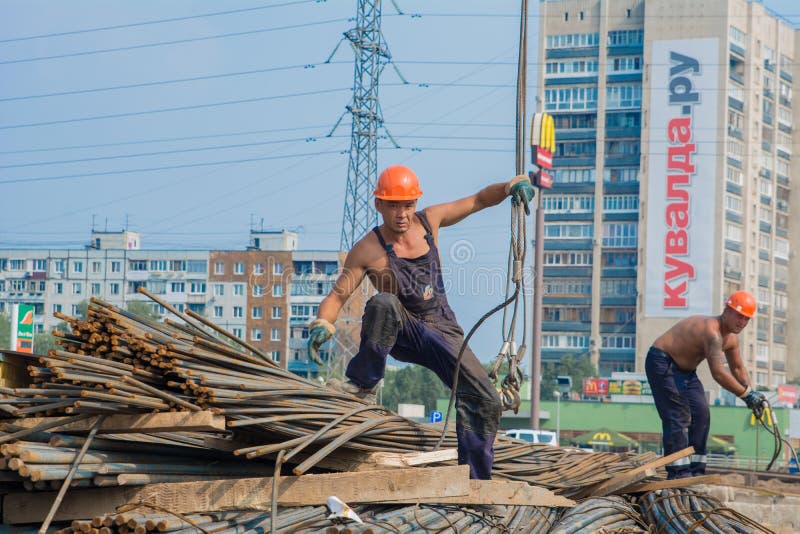 Male Construction Workers Working at a Construction Site Editorial ...