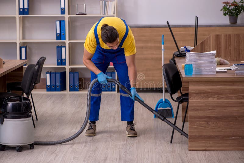 Young Male Contractor Cleaning the Office Stock Image - Image of ...