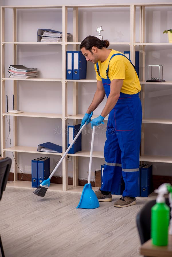 Young Male Contractor Cleaning the Office Stock Image - Image of ...