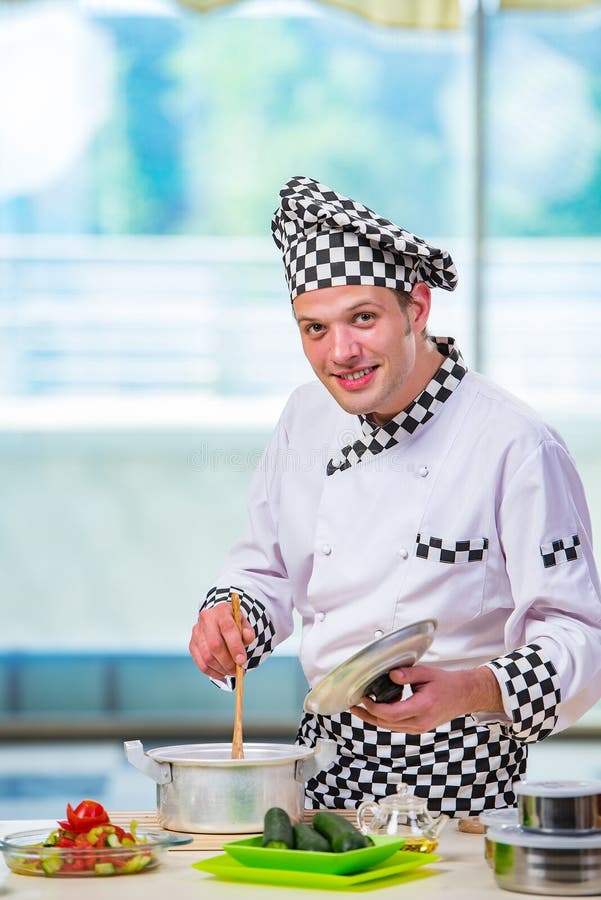 The Male Cook Preparing Food in the Kitchen Stock Photo - Image of ...