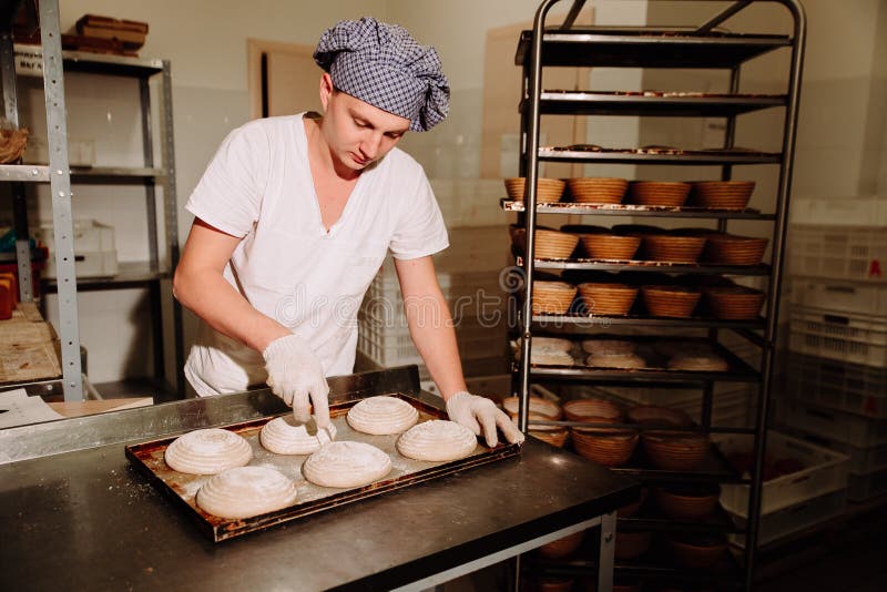 Male Cook Shaping Dough for Baking Bread Stock Image - Image of buns ...