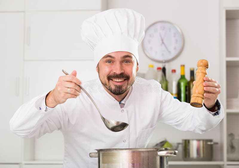 Male cook tasting food stock image. Image of caucasian - 256306643