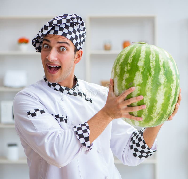 Male Cook with Watermelon in Kitchen Stock Photo - Image of male ...
