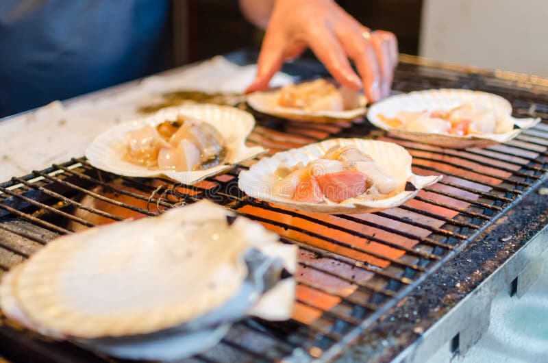 Male is cooking shell stock image. Image of garlic, appetizer - 62753901