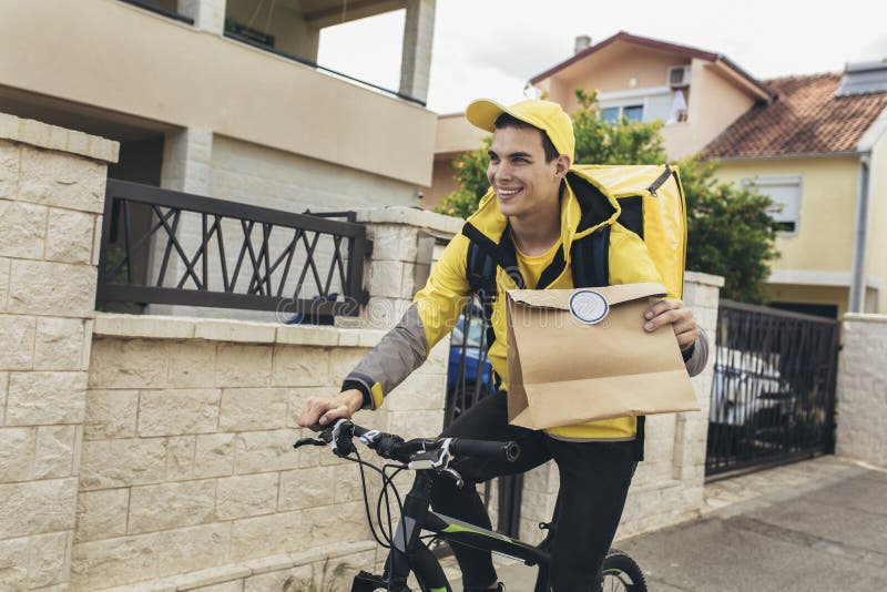 Courier with Bicycle Delivering Packages Stock Photo - Image of bike ...