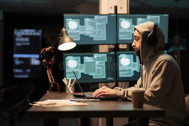 Male Criminal Trying To Break Database Server Stock Photo - Image of ...