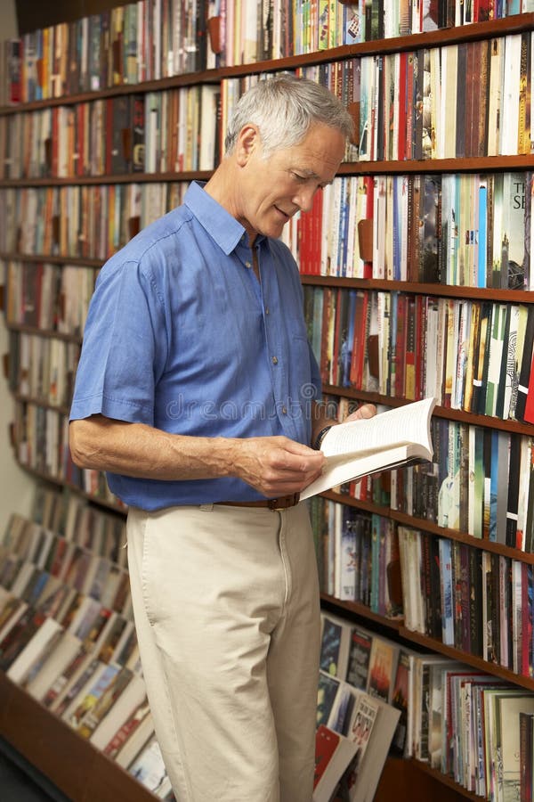 Male customer in bookshop stock image. Image of adult - 10971811