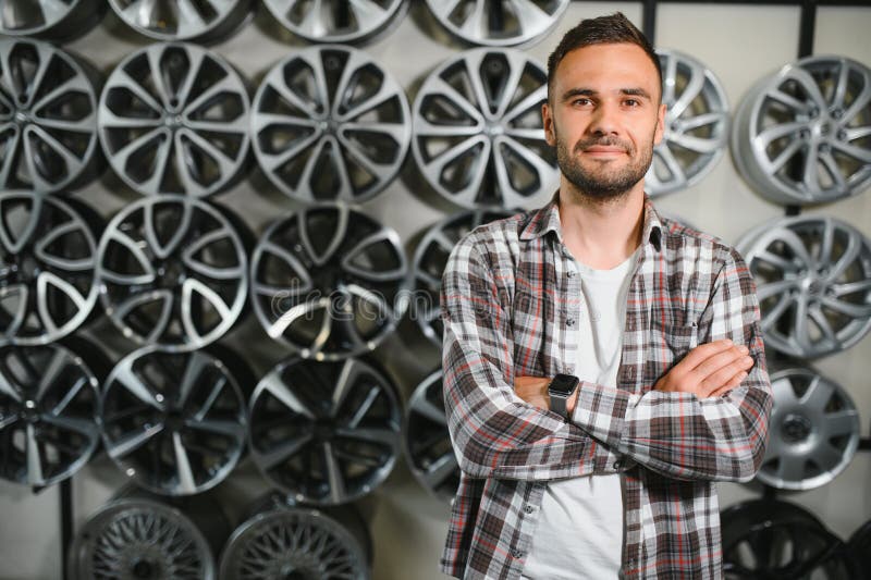 A Male Customer in a Car Rim Shop Stock Photo - Image of drive ...