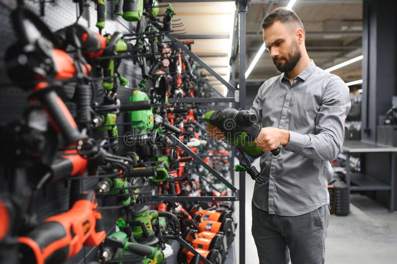 Male Customer in a Power Tool Store Stock Photo - Image of choice ...