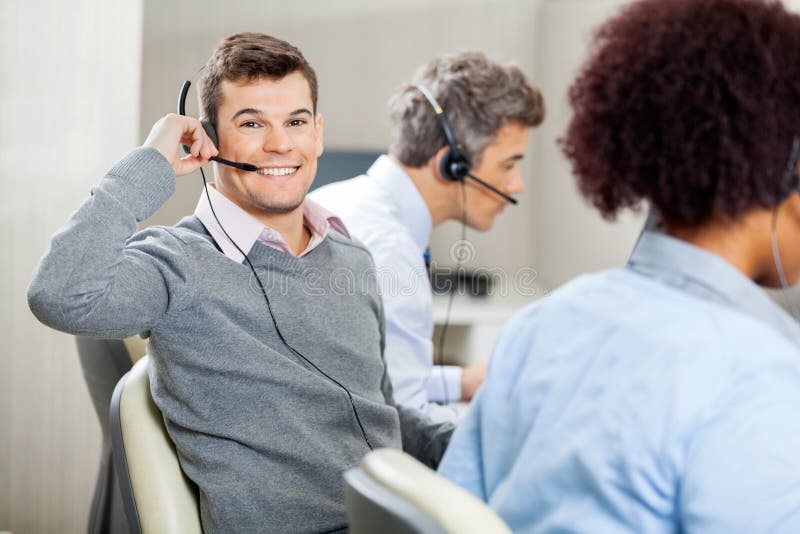 Male Customer Service Representative Using Headset Stock Image - Image ...