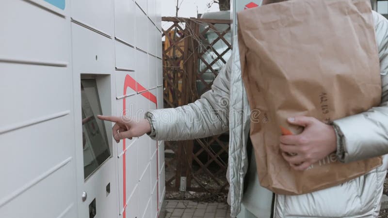 Male Customer Using Self-service Automated Delivery Terminal To Send ...