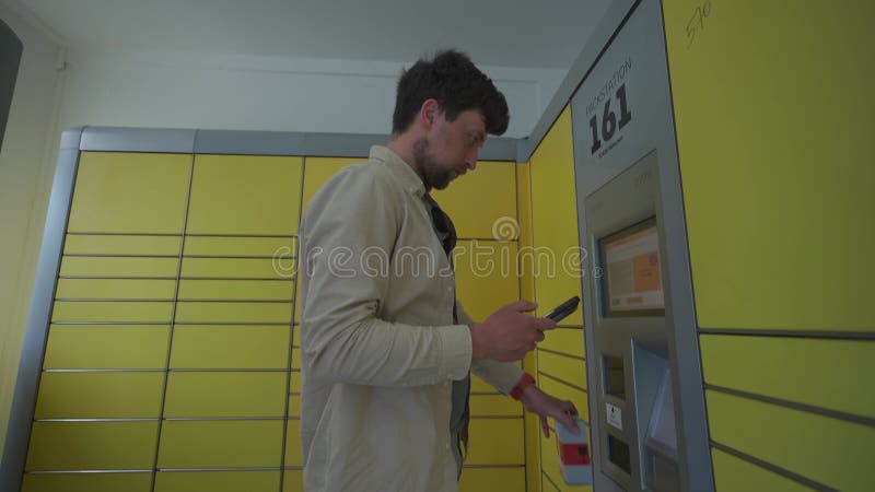 Yellow Self-service Postal Terminal. Sending Parcel. Parcel Pick Up ...