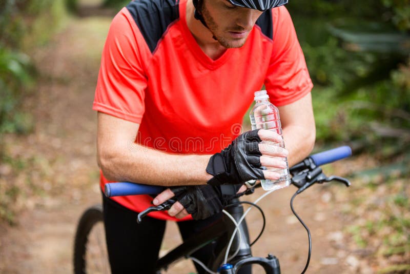 Male Cyclist Taking Break during Cycling Stock Photo - Image of ...