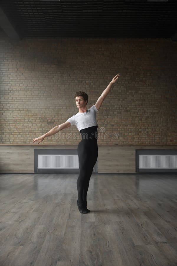 Male Dancer Practicing in Ballet Studio Holding Training Class Stock ...