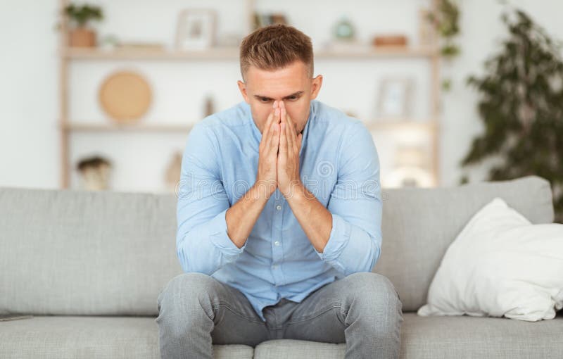 Depressed Sad Man Sitting on Couch, Thinking about Problems Stock Image ...