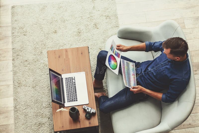 Male Designer Choosing a Color for a New Project . Stock Image - Image ...