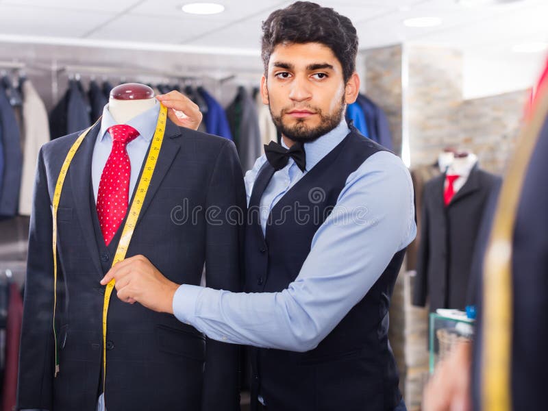Male Designer is Creating Business Image with Red Tie Stock Photo ...