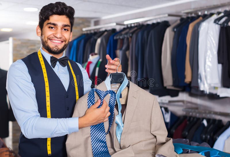 Male Designer is Picking Up a Tie for Light Jacket Stock Photo - Image ...