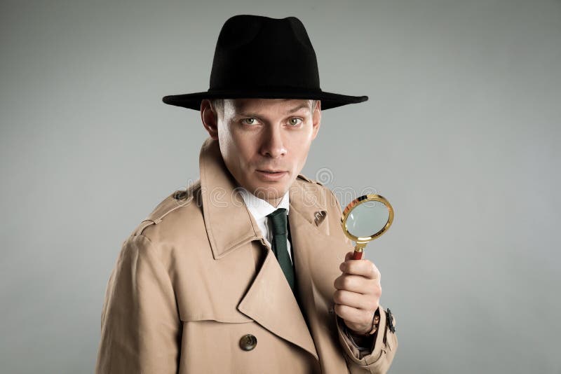 Male Detective with Magnifying Glass on White Background Stock Image ...