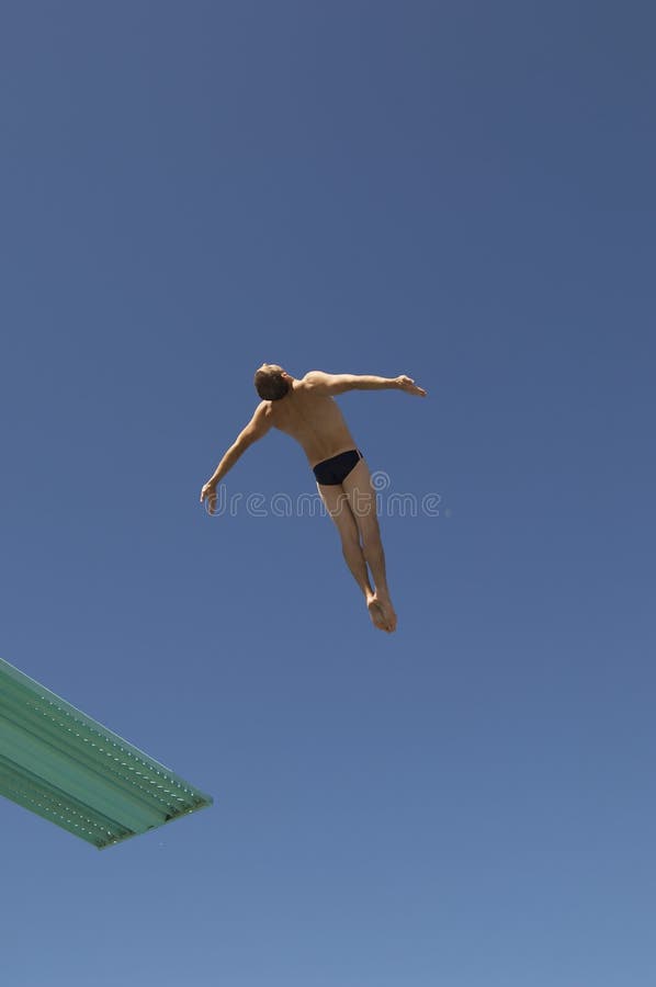 Female Divers Diving in Midair Stock Image - Image of leisure, athlete ...