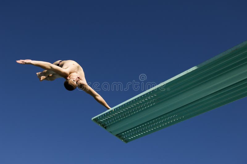 Male Diver Diving Backwards in Mid Air Stock Photo - Image of pool ...