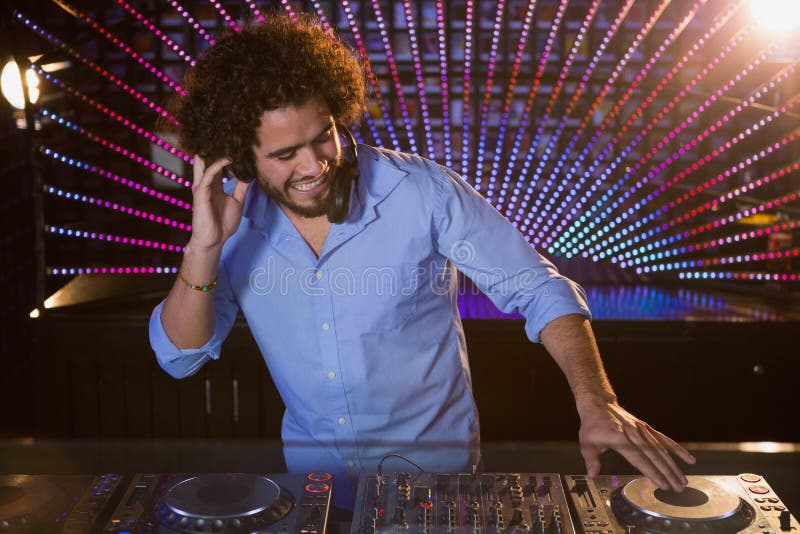 Male DJ playing music stock image. Image of disc, music - 78710779