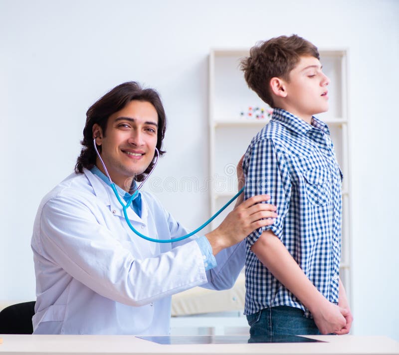 Male Doctor Examining Boy by Stethoscope Stock Photo - Image of checkup ...